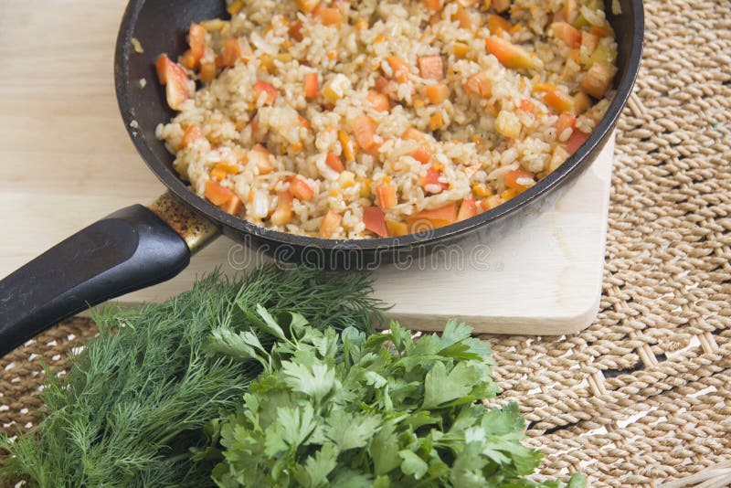 Rice risotto in a pan stock photo. Image of beans, grain - 61675760