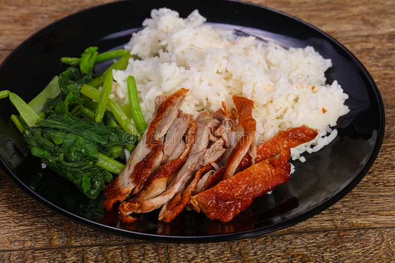 Rice with Roasted Duck Breast Stock Photo - Image of food, gourmet ...