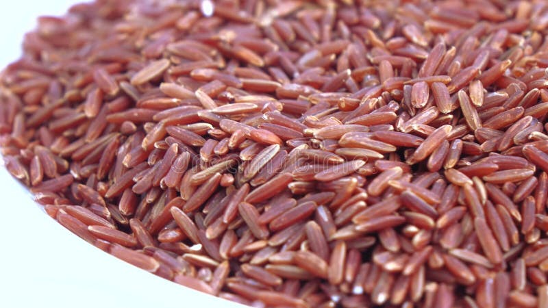 Red Kernel Rice in bulk stock footage. Video of heap - 111192598