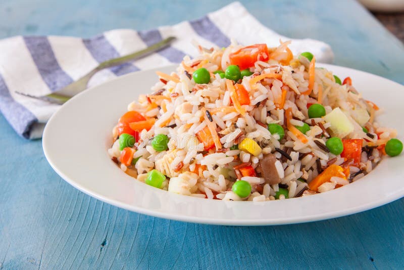 Rice salad stock photo. Image of tomato, peas, vegetarian - 46011726