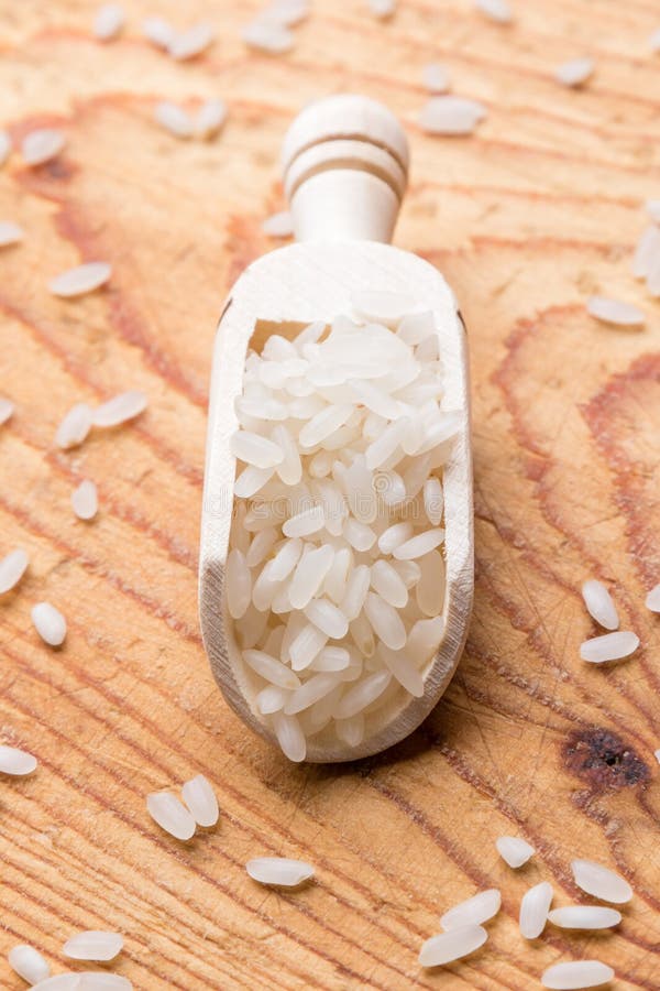 Rice with scoop stock image. Image of scoop, cereal, grain - 73459259