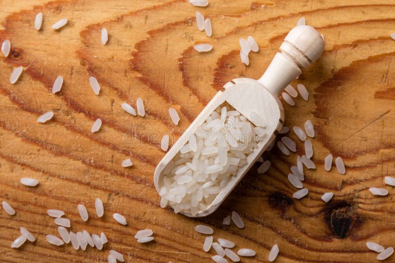 Rice with scoop stock image. Image of eating, uncooked - 73459305