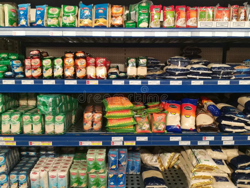 Variety of Rice Stack Up in Asian Market Editorial Stock Photo - Image ...