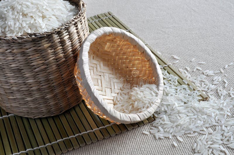 Rice in small baskets stock photo. Image of bamboo, hunger - 13873352