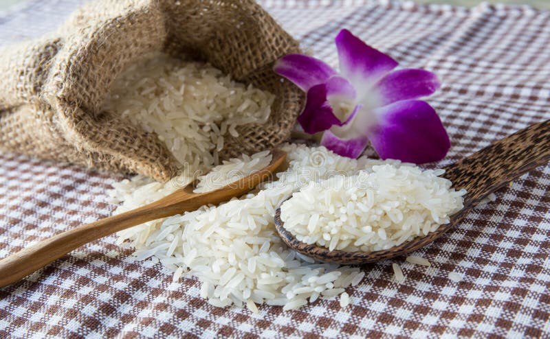 Rice in small burlap sack stock photo. Image of crop - 42001490