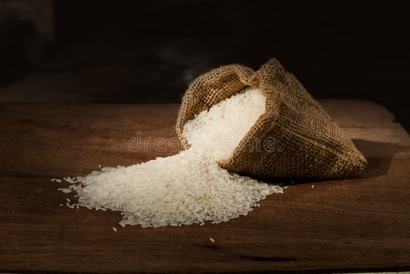 Rice in small burlap sack stock photo. Image of organic - 53259508