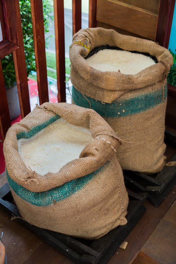 Rice in small burlap sack stock image. Image of ingredient - 70744909
