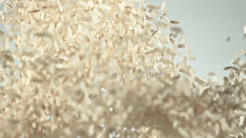 Rice Soars Up and Falls Down. Filmed is Slow Motion 1000 Fps. Stock ...