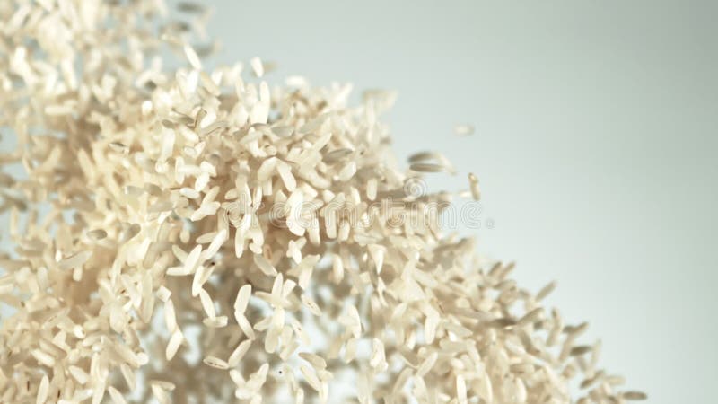 Rice Soars Up and Falls Down. Filmed is Slow Motion 1000 Fps. Stock ...