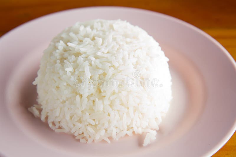 Rice on soft pink dish stock photo. Image of diet, white - 79772500
