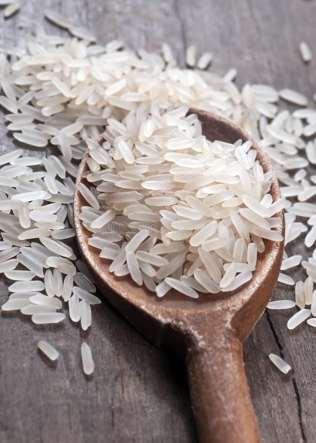 Rice in spoon stock photo. Image of long, cereal, dish - 22911340