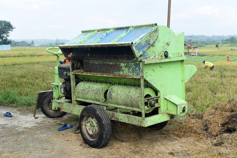 Thresher machine stock photo. Image of harvest, tree - 25755416