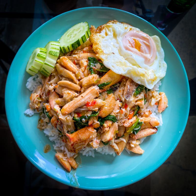 Rice Topped with Stir-fried Crab and Basil Stock Image - Image of meal ...