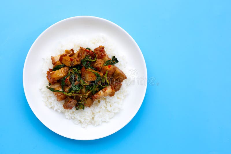 Rice Topped with Stir Fried Crispy Pork with Holy Basil Stock Photo ...