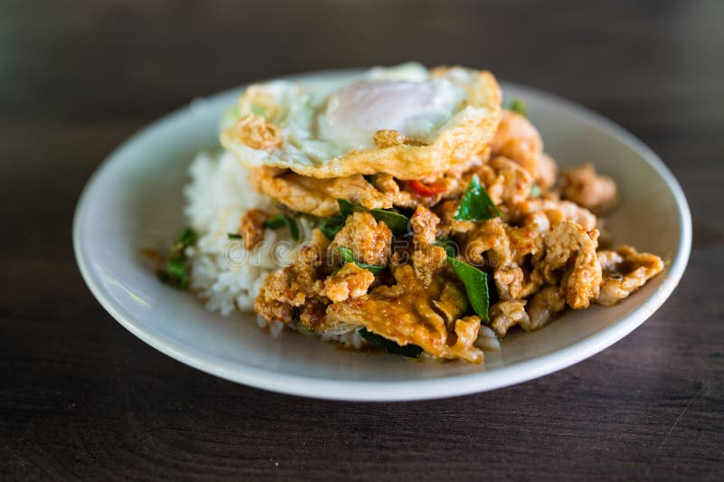 Rice Topped with Stir Fried Pork and Red Curry Paste with Egg Stock ...
