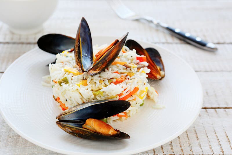 Rice with Vegetable Mix and Mussels Stock Photo - Image of carrots ...