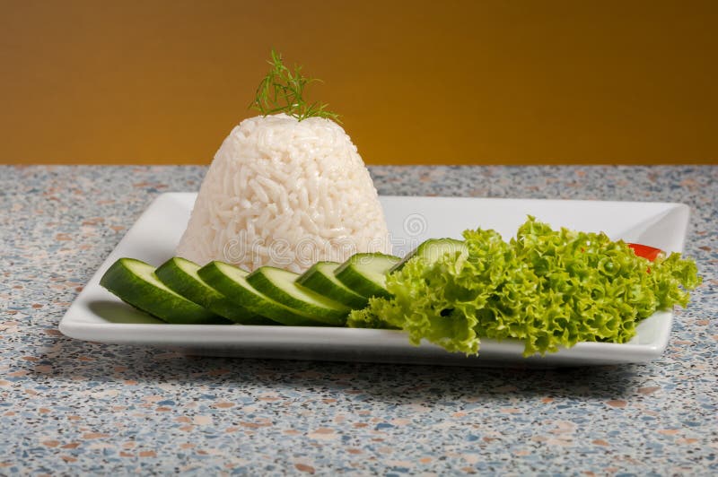 Rice on white plate stock photo. Image of food, cuisine - 44571370