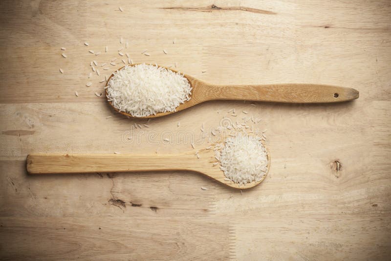 Rice on Wooden Spoons stock image. Image of culture, grain - 55458063