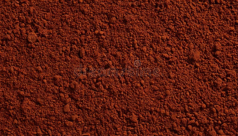 Rich Brown Powdered Spice Texture Spread on a Flat Surface in Natural ...