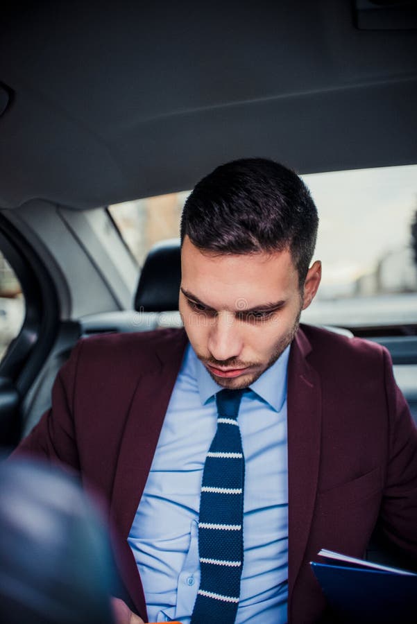 Rich Businessman Driving in a Limo and Speak on a Phone Stock Image ...