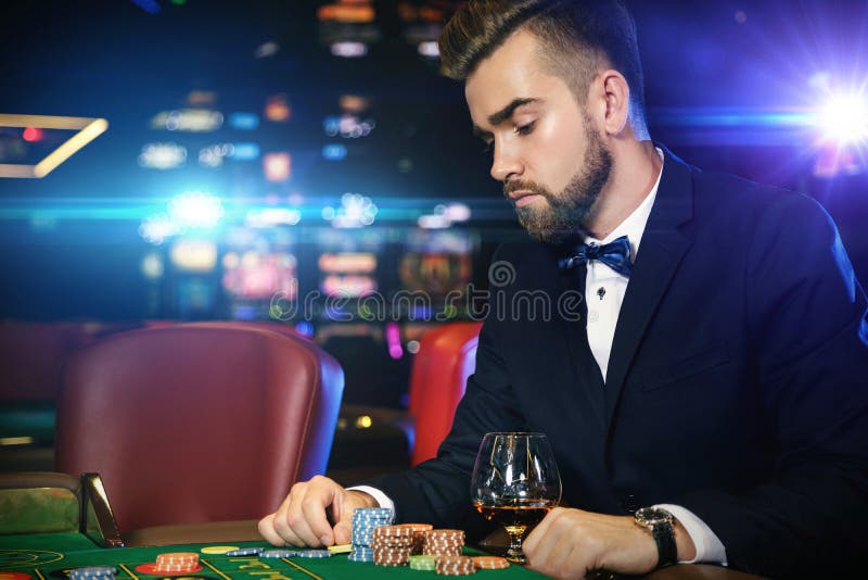 Handsome Man Playing Roulette in the Casino Stock Image - Image of ...