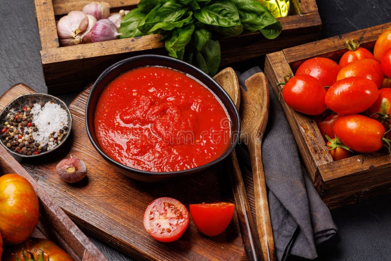 Rich homemade tomato sauce stock photo. Image of ingredients - 300978916