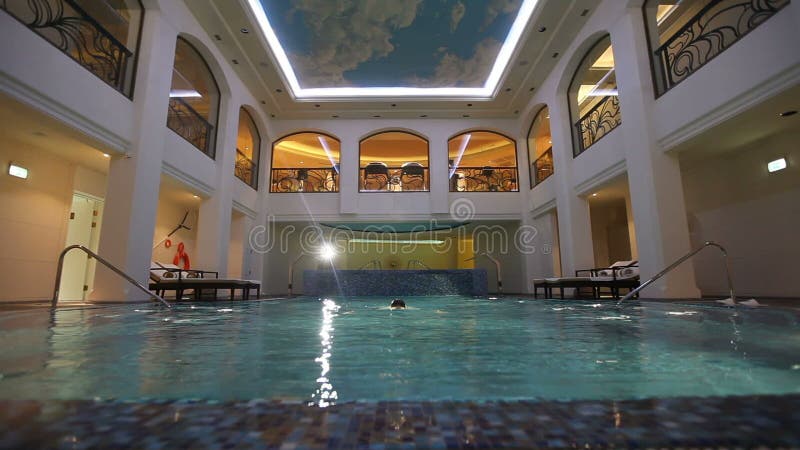 The Rich Man is Swimming in the Pool. Stock Footage - Video of interior ...