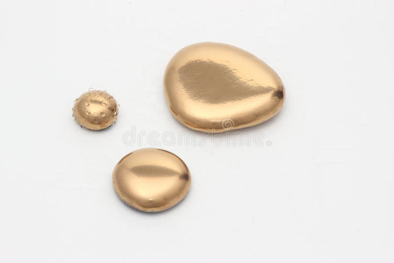 Gold Pebble Contemplation of Richness Stock Photo - Image of golden ...