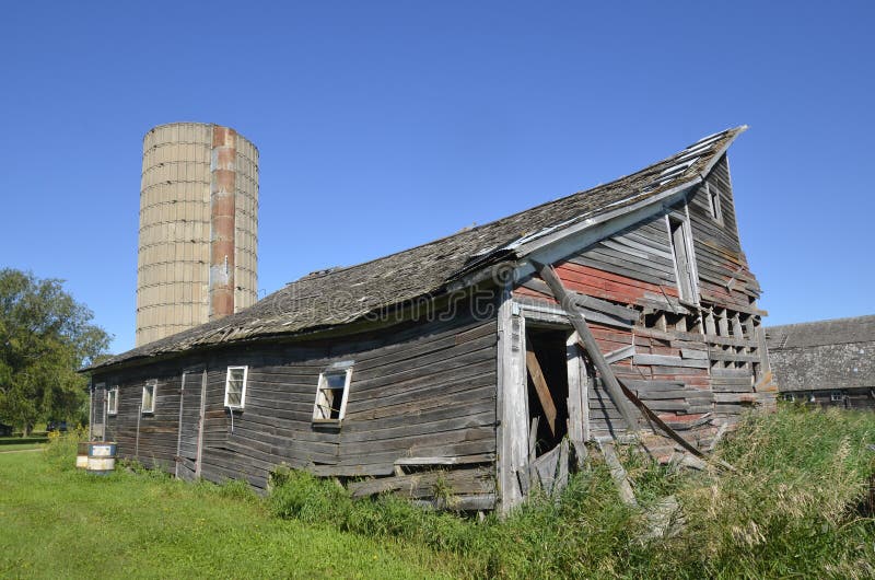Old Barn Falling into Ruins Stock Photo - Image of forgotten, milk ...