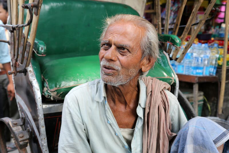Rickshaw driver in Kolkata editorial image. Image of heavy - 314550650