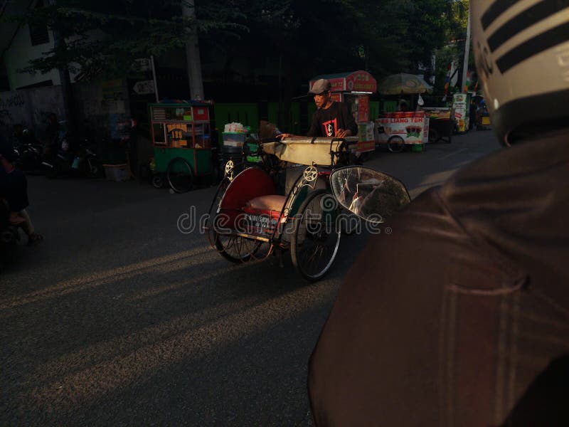 Rickshaw driver and light editorial photo. Image of driver - 262481086