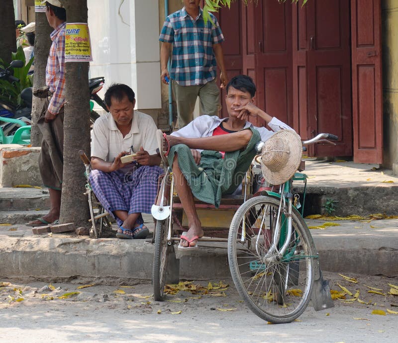 Rickshaw Driver Waiting for Passengers in Mandalay, Myanmar Editorial ...