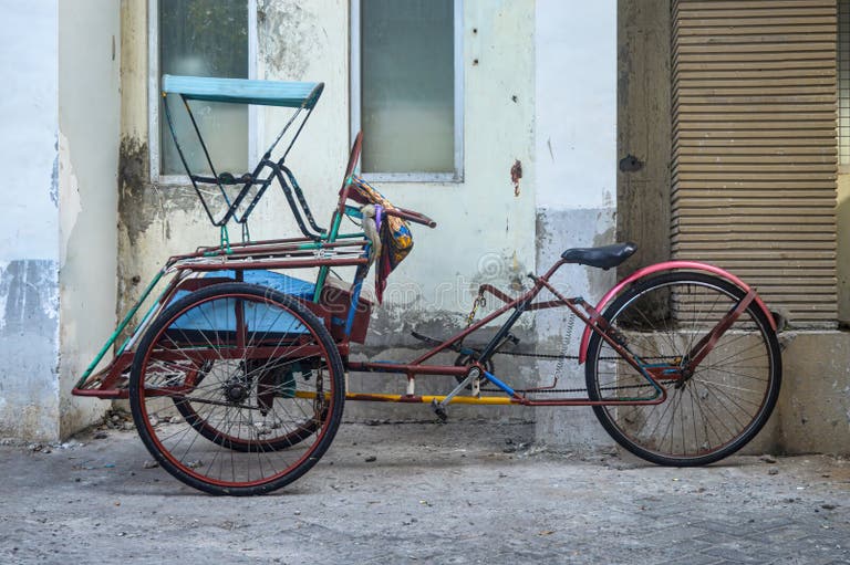 A Rickshaw Parked on the Side of the Road. Stock Photo - Image of bike ...