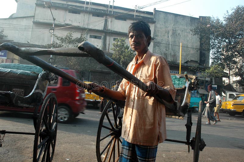Rickshaw Puller in Kolkata editorial stock image. Image of migrant ...
