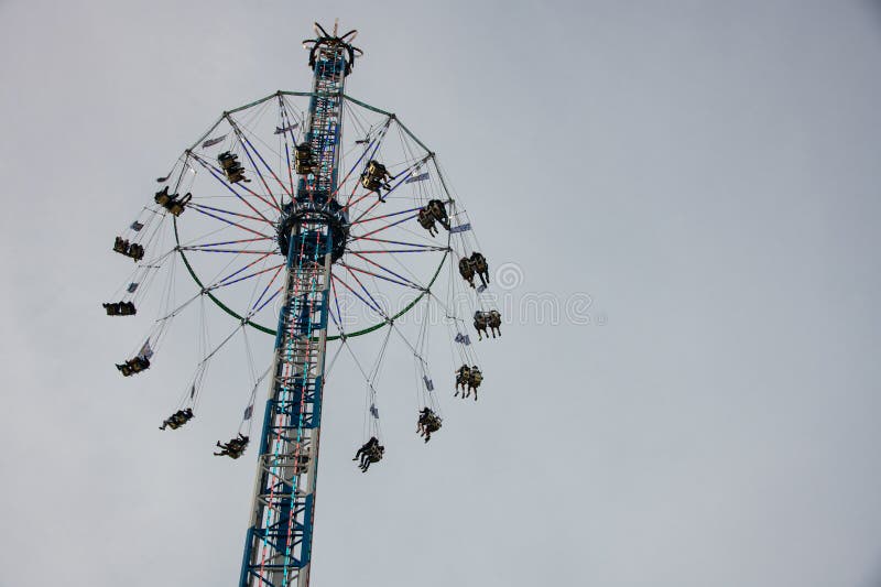 Ride Entertaining People in Amusement Parks Moving Up and Down and ...
