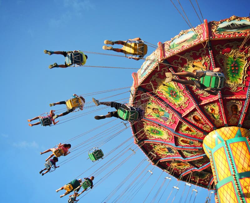 Ride Fair Spinning Around People Having Fun Stock Photos - Free ...