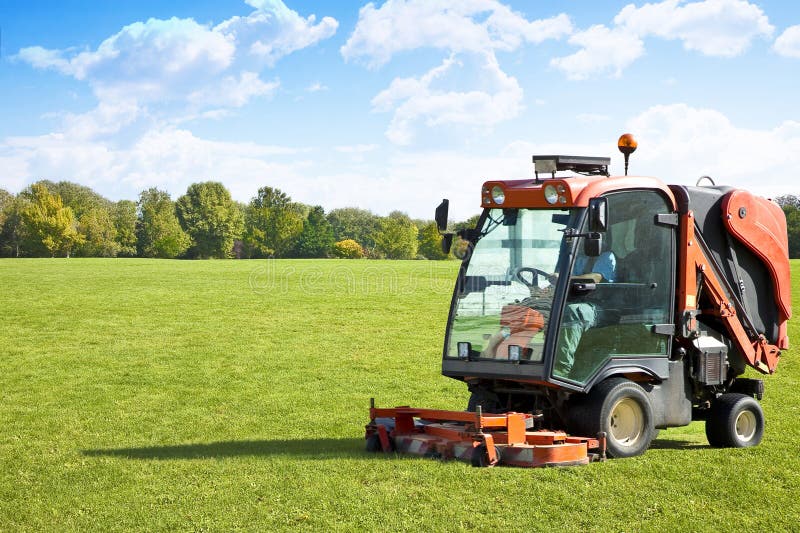 Ride on Lawn Mower Cutting Fresh Grass - Professional Lawnmower with ...