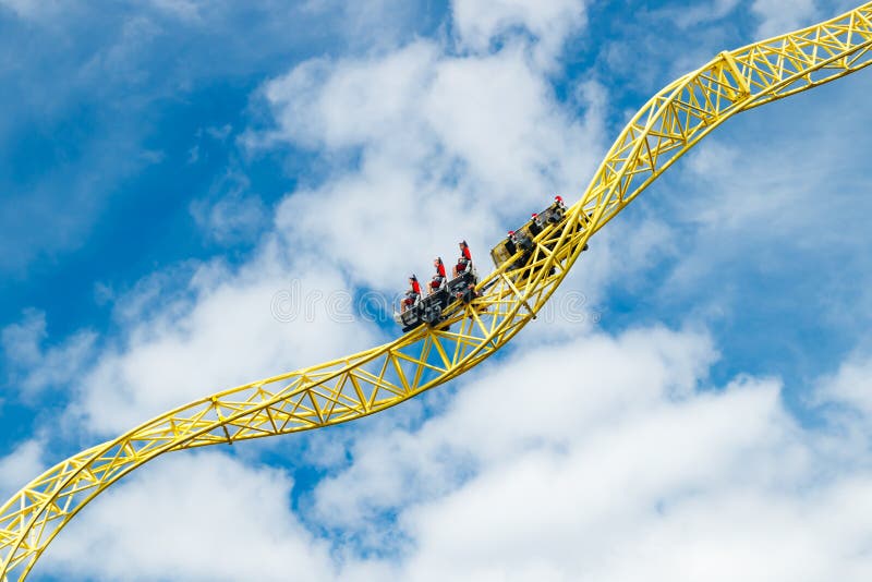 Ride Roller Coaster in Motion in Amusement Park Stock Photo - Image of ...