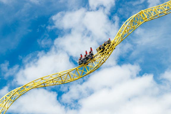 Ride Roller Coaster in Motion in Amusement Park Stock Photo - Image of ...