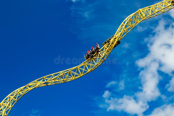 Ride Roller Coaster in Motion in Amusement Park Stock Image - Image of ...