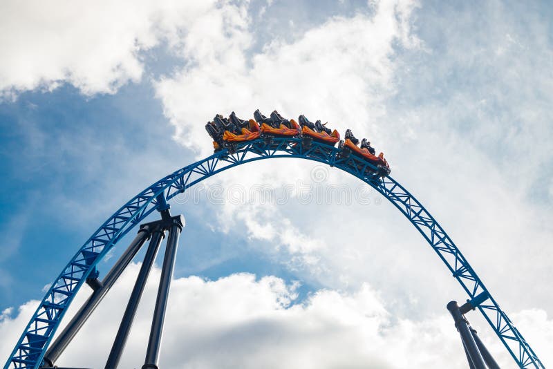 Ride Roller Coaster in Motion in Amusement Park Stock Image - Image of blue, family: 228897553