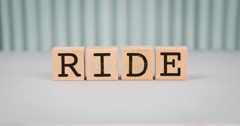 Ride Text Made of Wooden Cube on Wooden Background. Stock Photo - Image ...