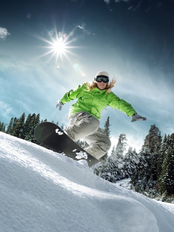 Jumping Snowboarder from Hill in Winter Stock Photo - Image of male ...