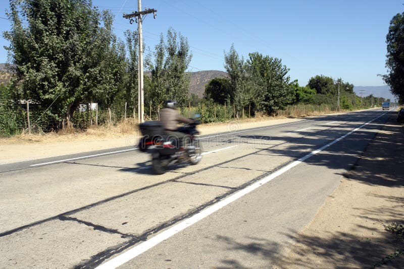 Riders on the road stock photo. Image of landscape, fast - 13784824