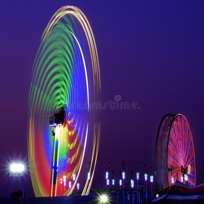 Rides at Fair or Carnival at Night Stock Image - Image of exciting ...