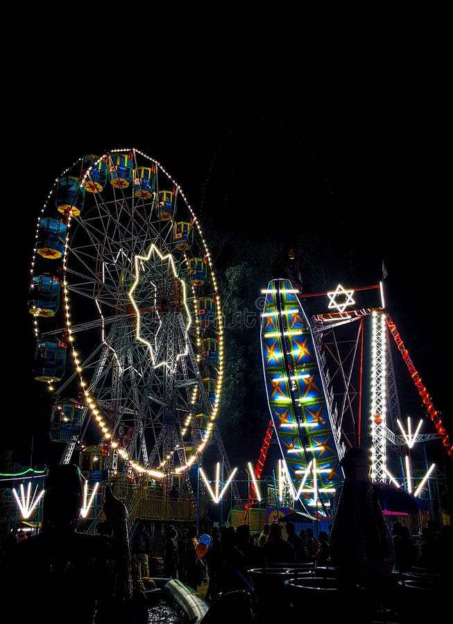 Rides editorial photography. Image of night, rides, light - 142181322