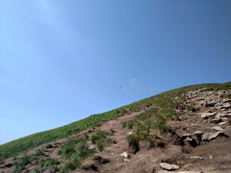 The Ridge of the Mountains Airplane in Sky Horizontal Color Photo Stock ...