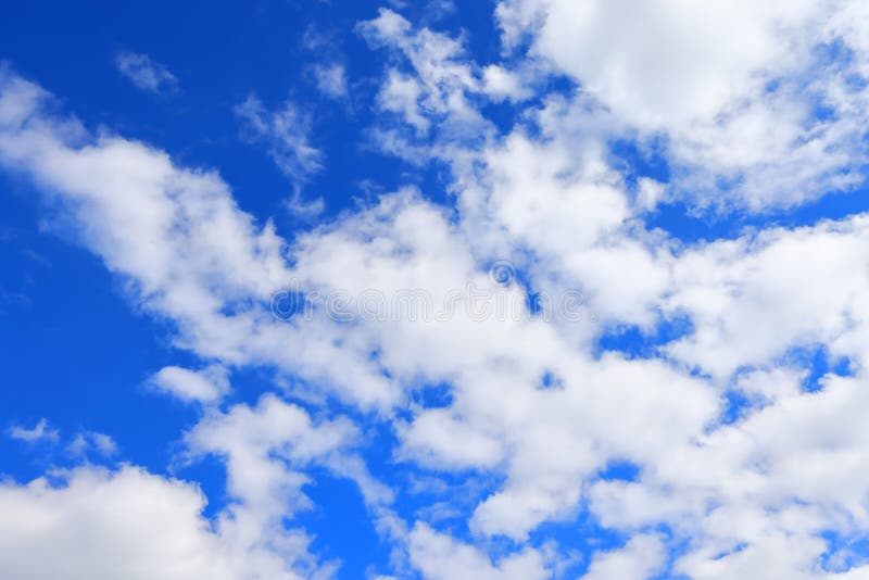 Ridge of White Clouds Against the Blue Sky, Bright Cloudy Background ...