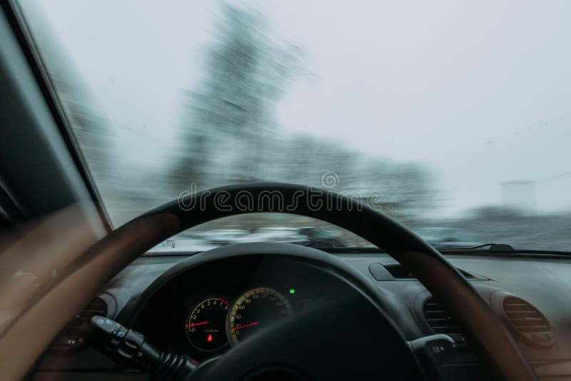 Riding Behind The Wheel Of A Car In Winter Stock Image - Image of ...