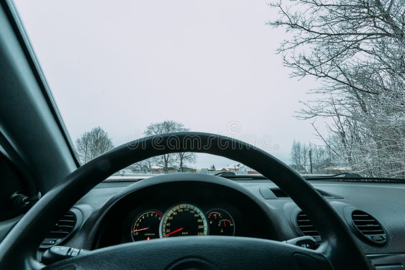 Riding Behind the Wheel of a Car in Winter Stock Photo - Image of ...